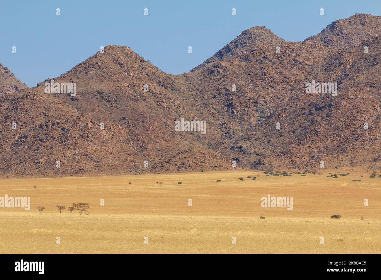 Namibian landscape. African savannah during a hot day. Mountain in the ...