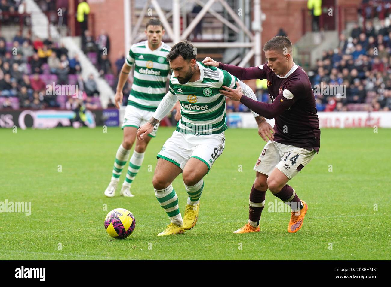 Celtic's Sead Haksabanovic and Heart of Midlothian's Cameron Devlin ...