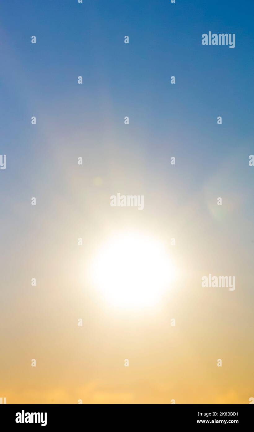 Blurred background. Sun in sky. Bright sun with sunbeams shines on ...