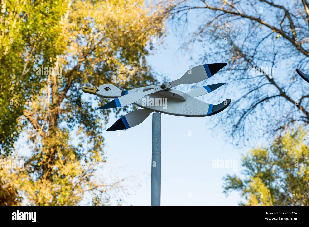Children's toy spinner (vane) spinning in the wind as a bird Stock ...