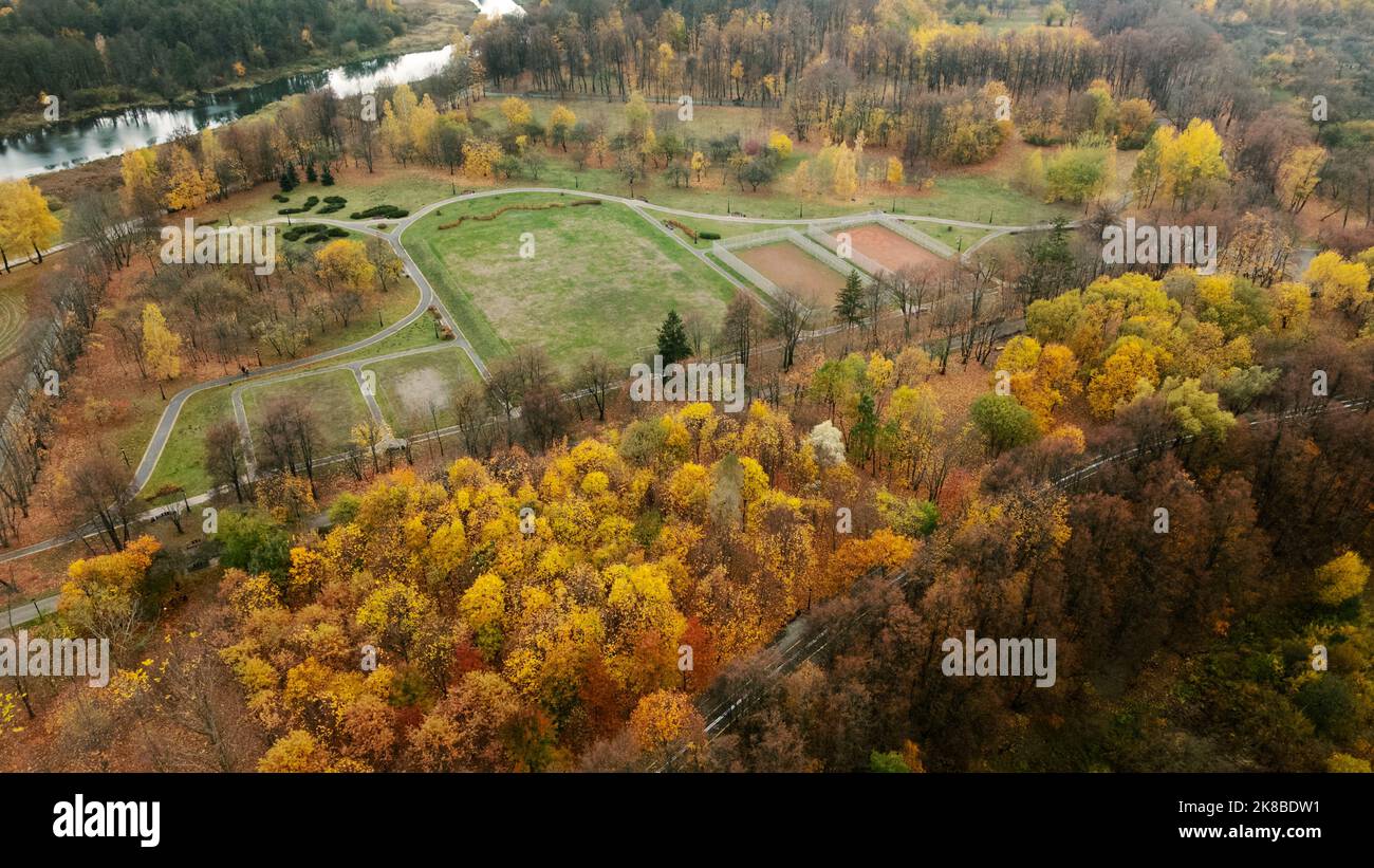 Autumn city park. Trees with colorful leaves. Sports grounds. Autumn ...