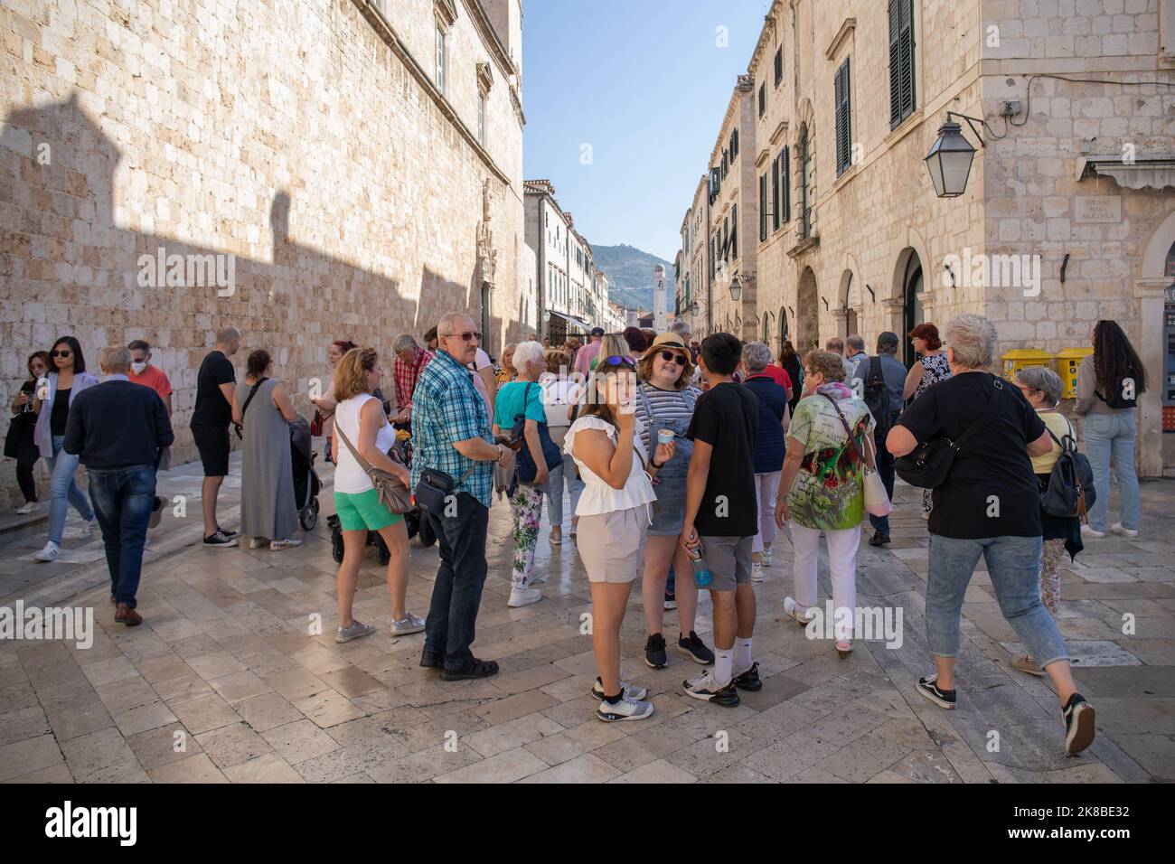 A large number of tourists can be seen exploring the old town center on ...