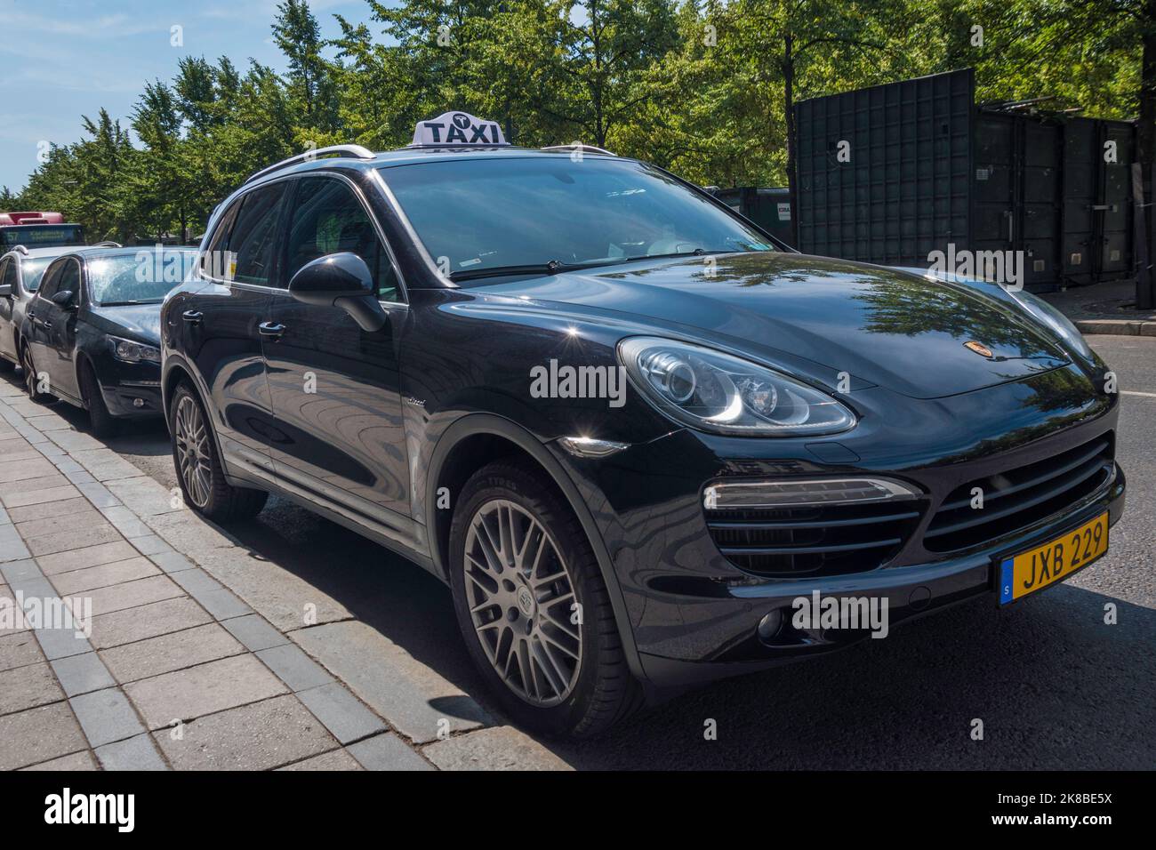 Porsche Cayenne taxi in Stockholm Sweden Stock Photo - Alamy