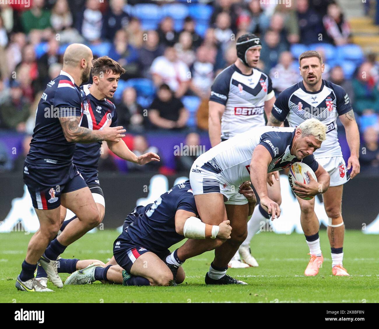 Ryan Hall of England is tackled by Benjamin Garcia of France during the ...