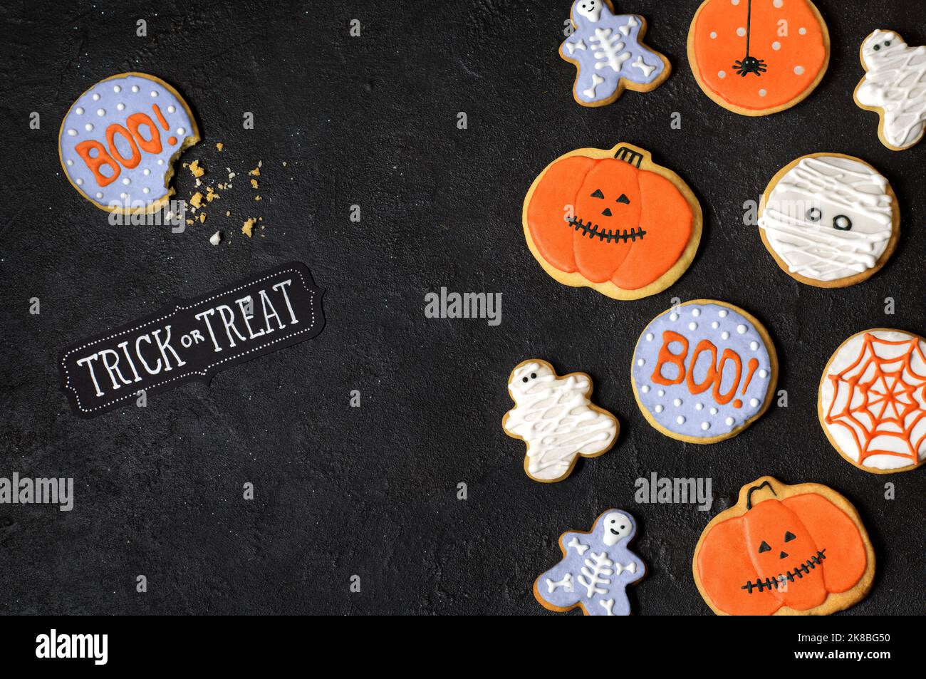 Homemade cookies for Halloween party on a black background Stock Photo ...