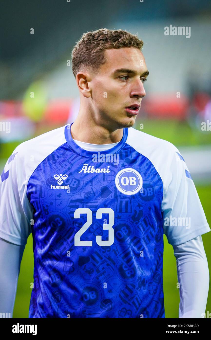 Odense, Denmark. 21st Oct, 2022. Aske Adelgaard (23) of OB is warming ...