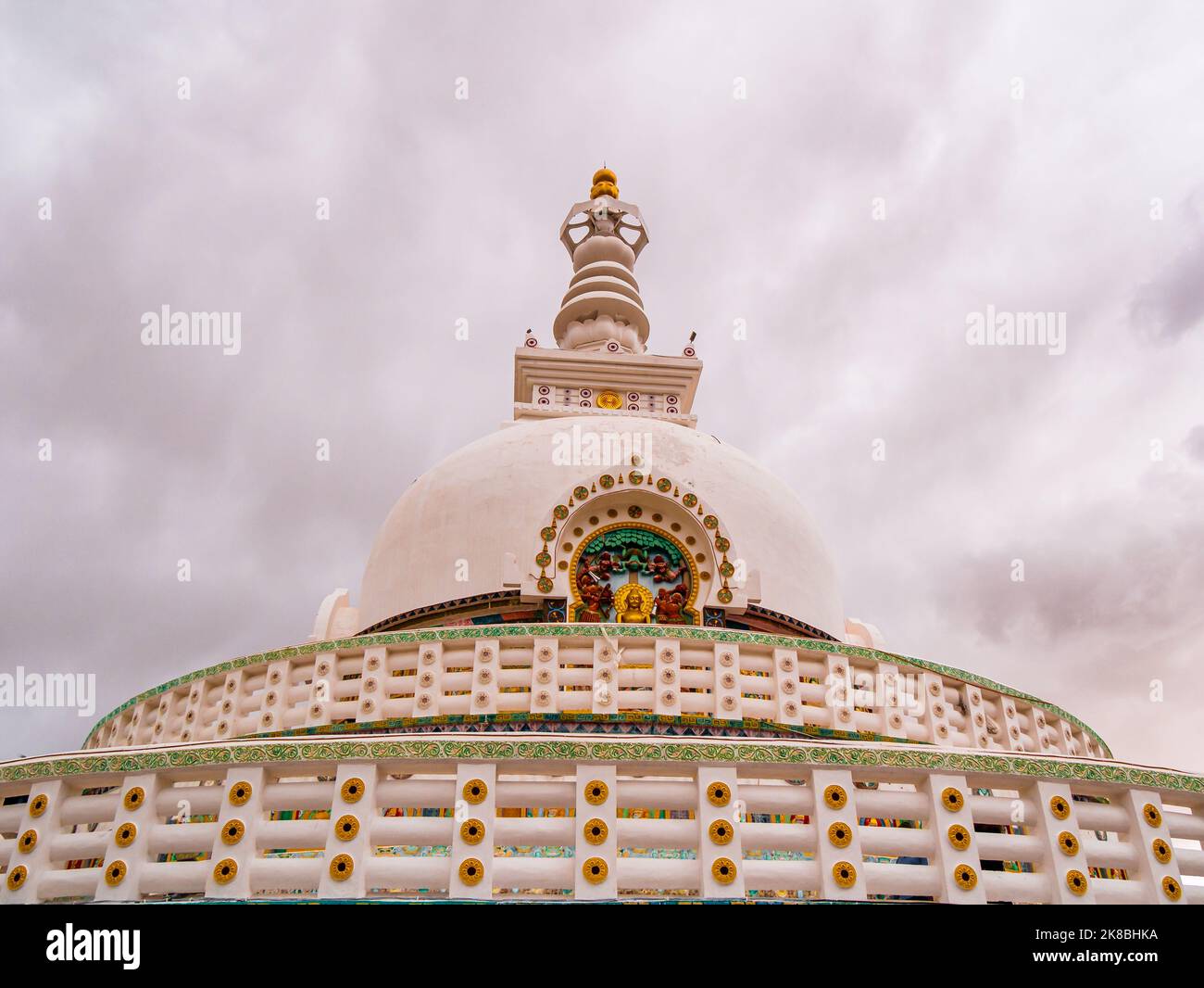 Buddha defeating the devils reliefs in Shanti Stupa. Shanti Stupa is a ...