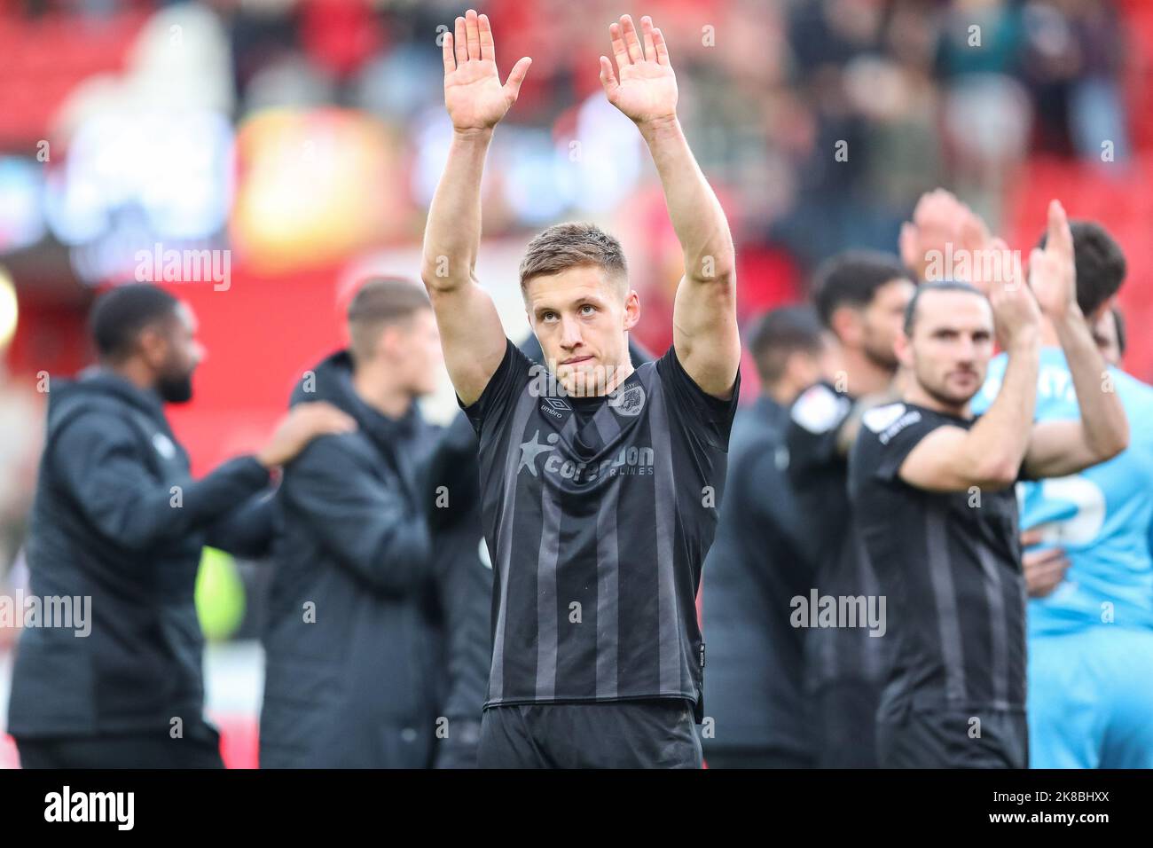 Greg Docherty #8 of Hull City applauds the travelling fans after the ...