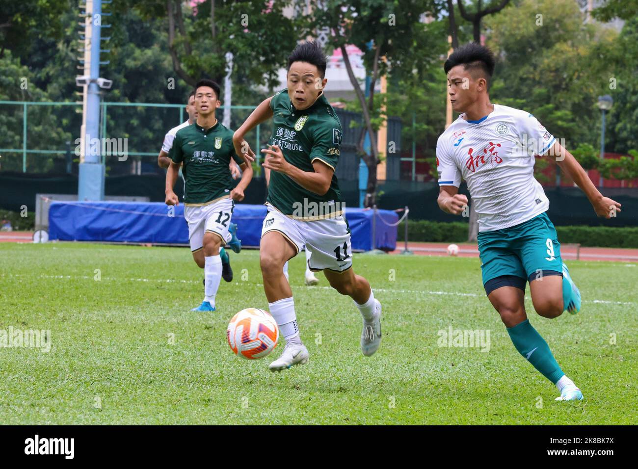 Sham Shui Po's Timothy Wong (green) and Tai Po's Chung Wai-keung in ...