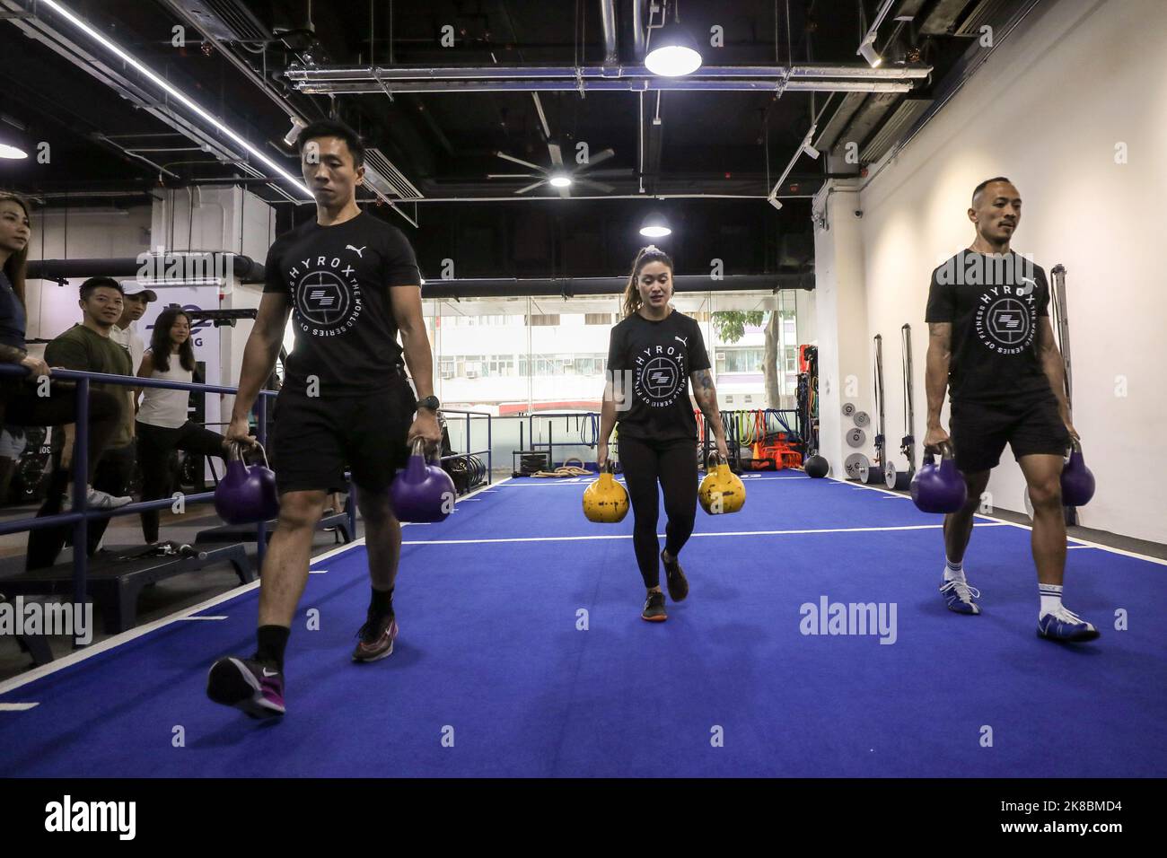 A demonstration of HYROX Fitness Race (the farmers carry section) at AQ ...