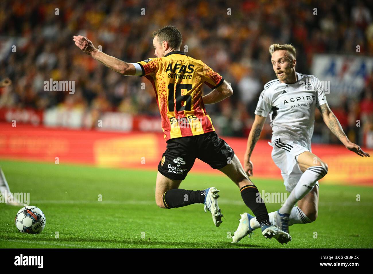 Mechelen's Rob Schoofs and Eupen's James Jeggo pictured in action ...