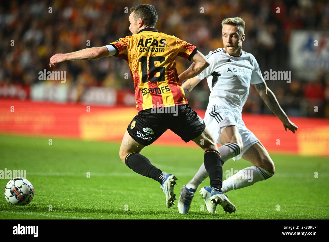 Mechelen's Rob Schoofs and Eupen's James Jeggo pictured in action ...