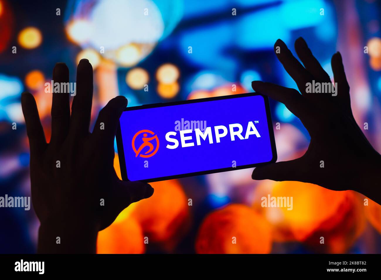 In this photo illustration, the Sempra Energy logo is displayed on a ...