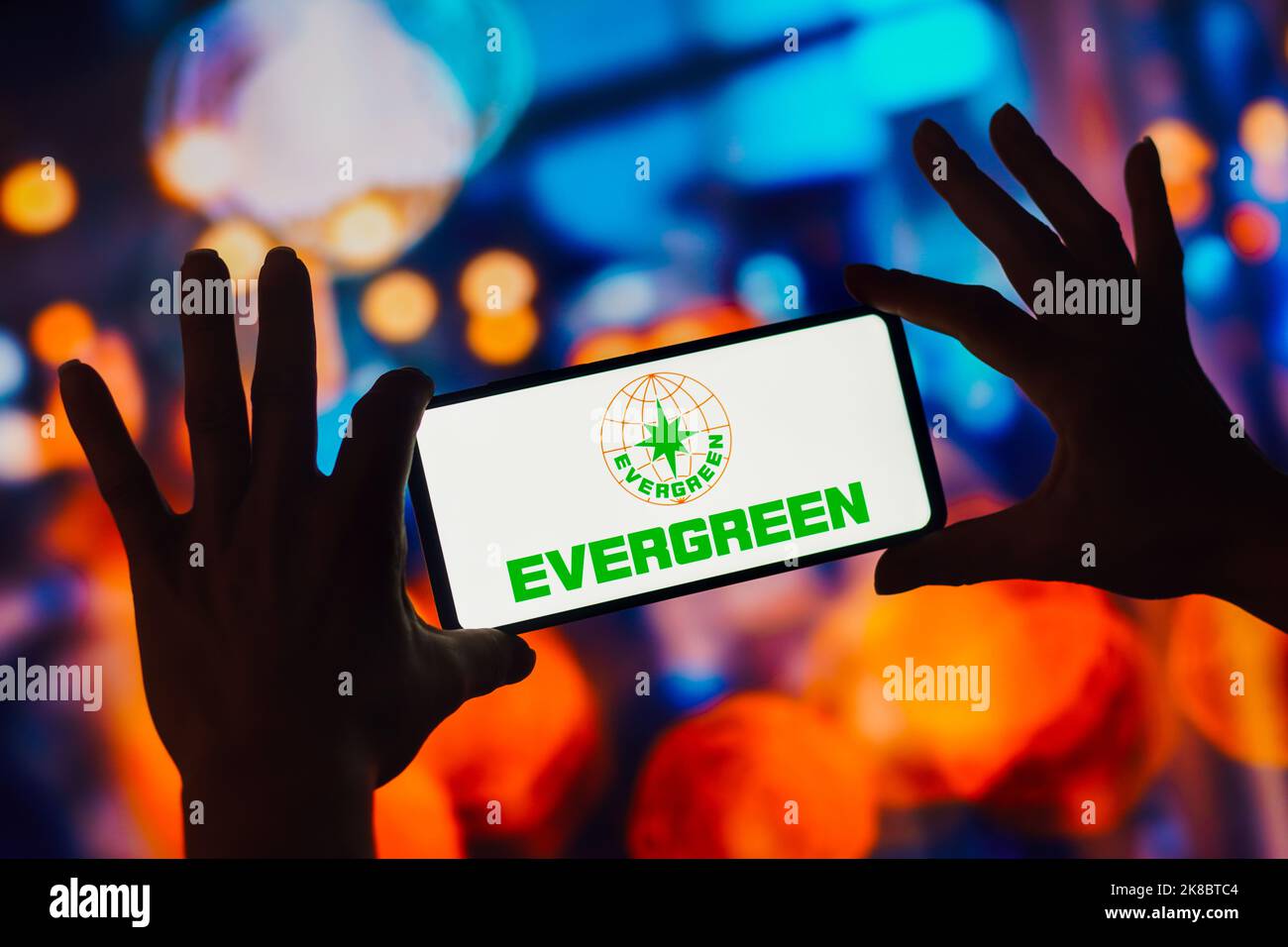 In this photo illustration, the Evergreen Marine Corporation logo is ...