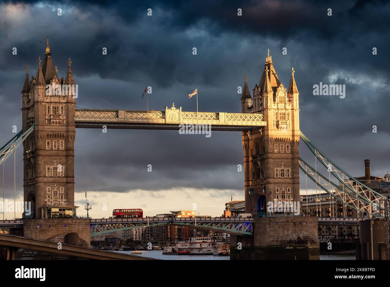 Historic Bridge over River Thames and Cityscape Skyline during dramatic ...