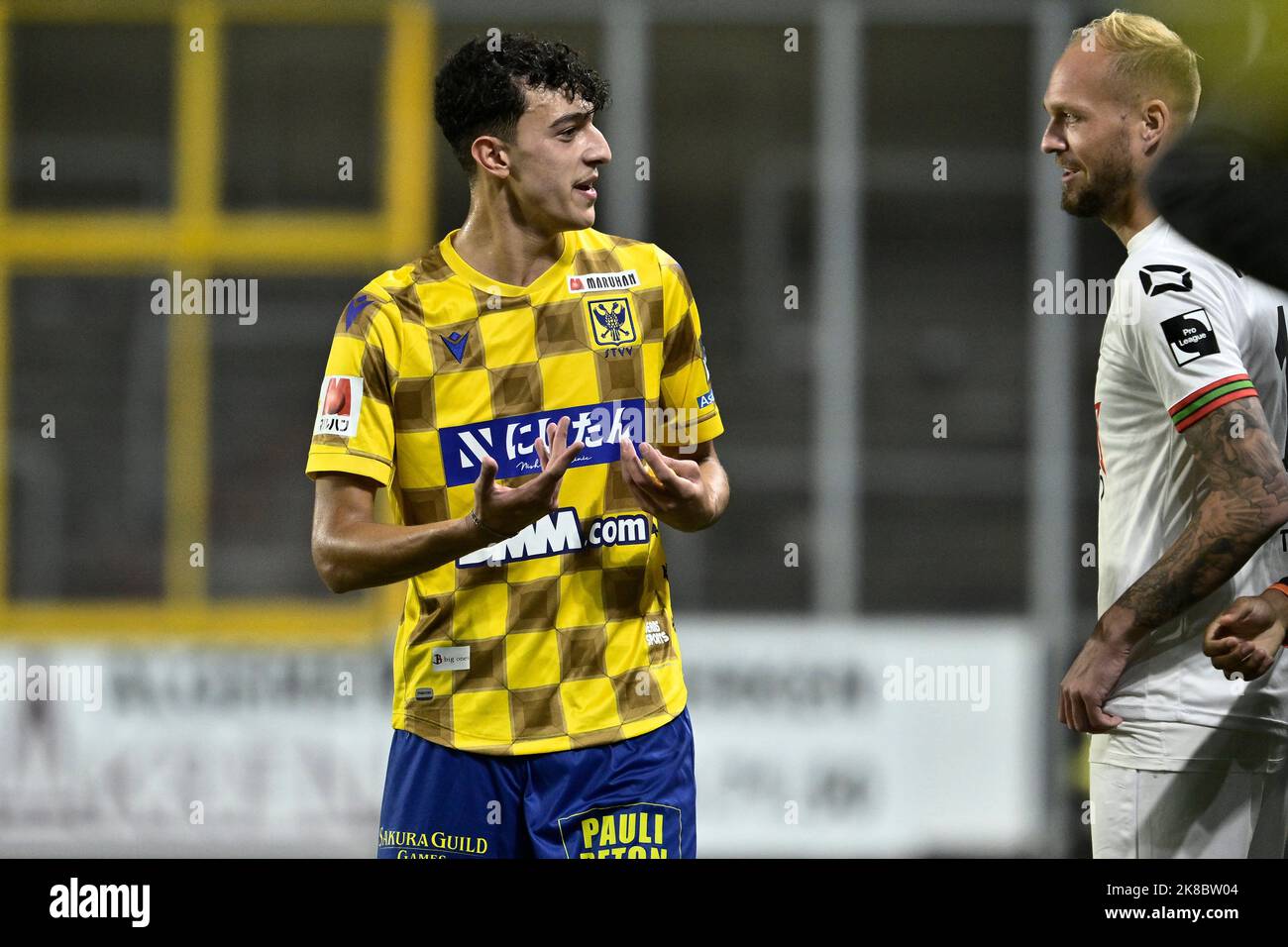 STVV's Ameen Al-Dakhil leaves the field after receiving a red card during a soccer match between ...