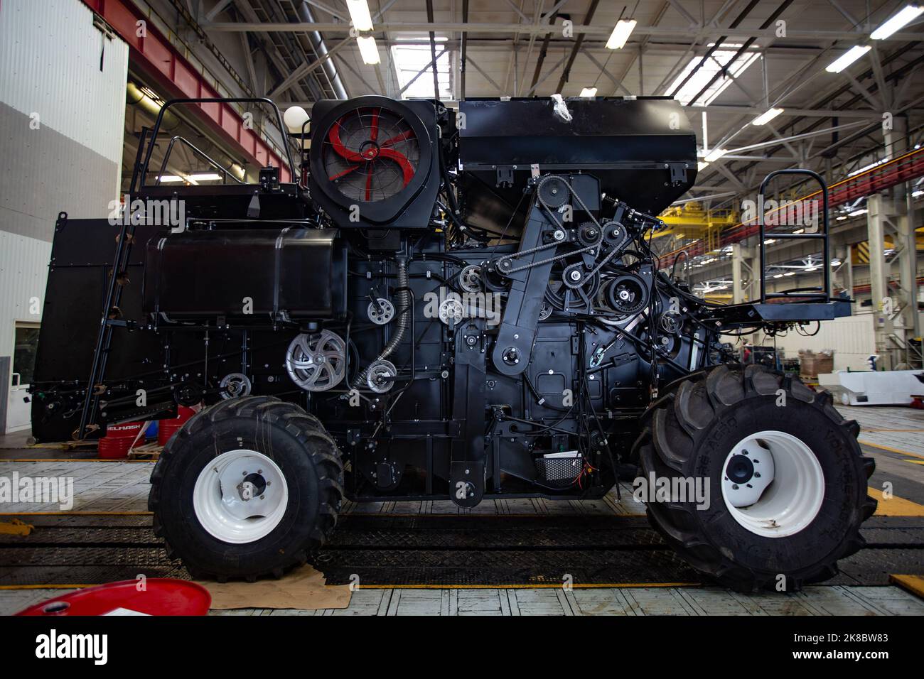 New assembled modern agricultural harvester in the factory Stock Photo ...