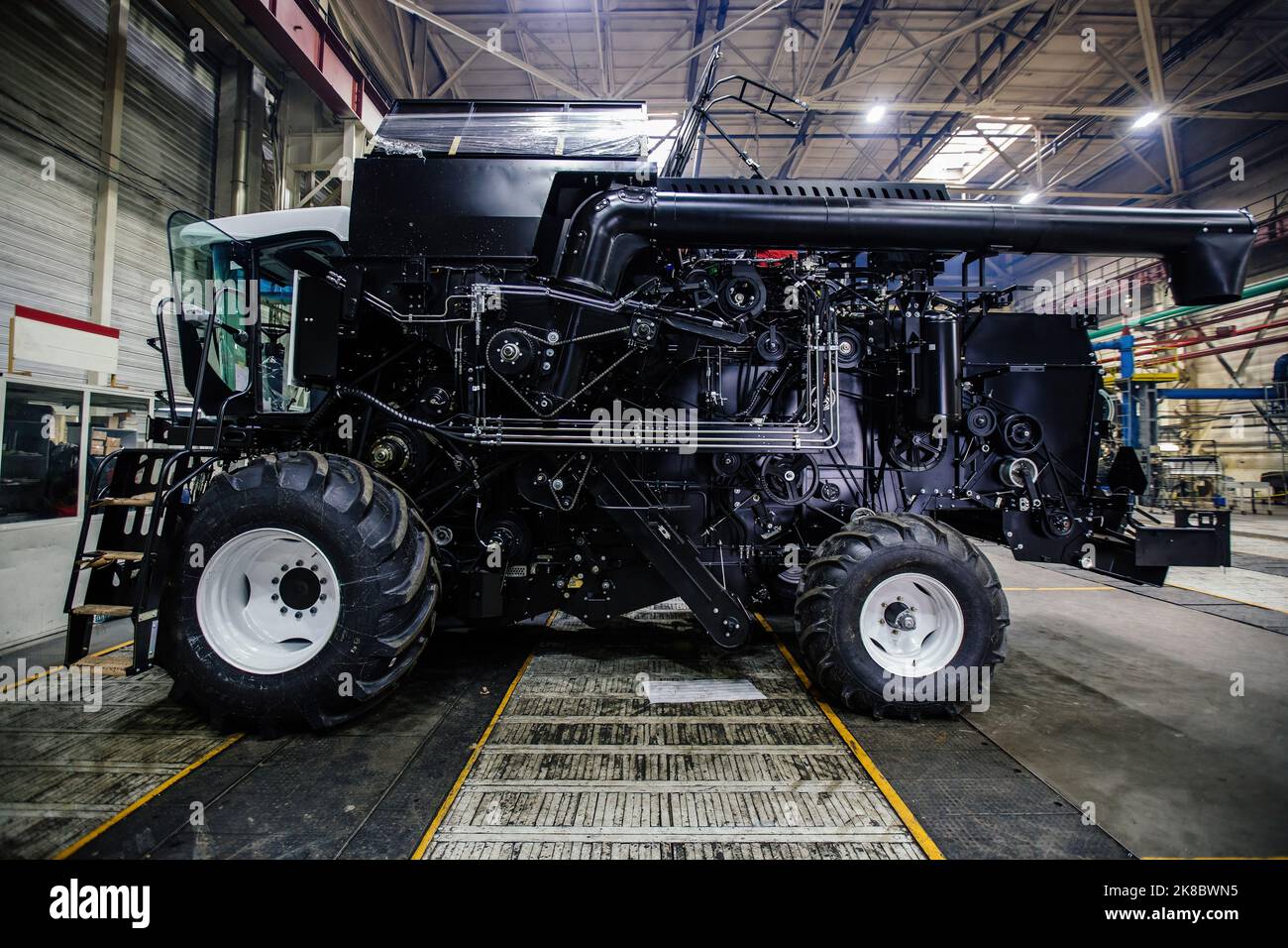 New assembled modern agricultural harvester in the factory Stock Photo ...