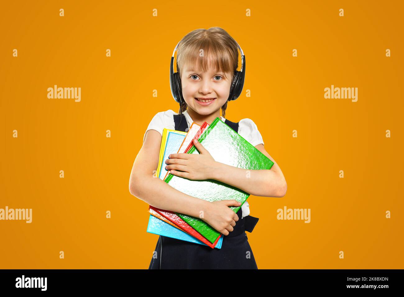 Cropped close up shot of a happy smart caucasian teenager schoolgirl ...