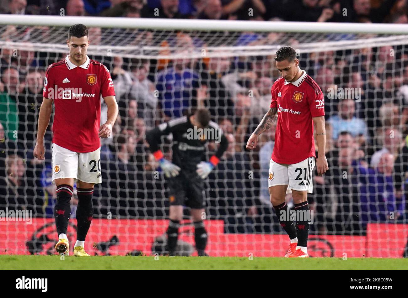 Manchester United's Diogo Dalot (left) and dos Santos Antony looks ...