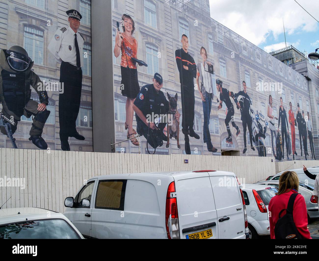 Paris France - June 20 2009; street mural showing police in variety of ...