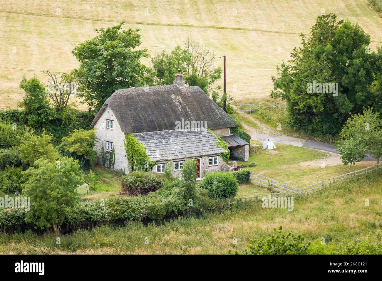 Aerial view of old thatched cottage in rural Dorset countryside Stock ...
