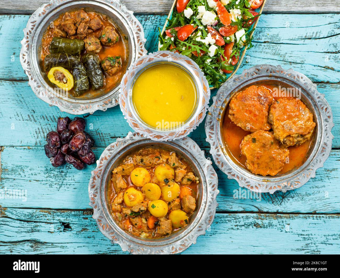 Eid Mubarak Traditional Ramadan Iftar dinner. Assorted tasty food in ...