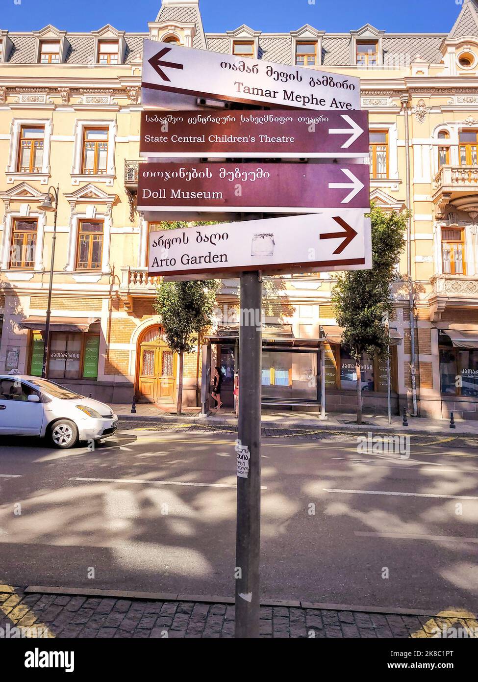 Tbilisi, Georgia - 07 23 2022: A post with street directions signs with ...