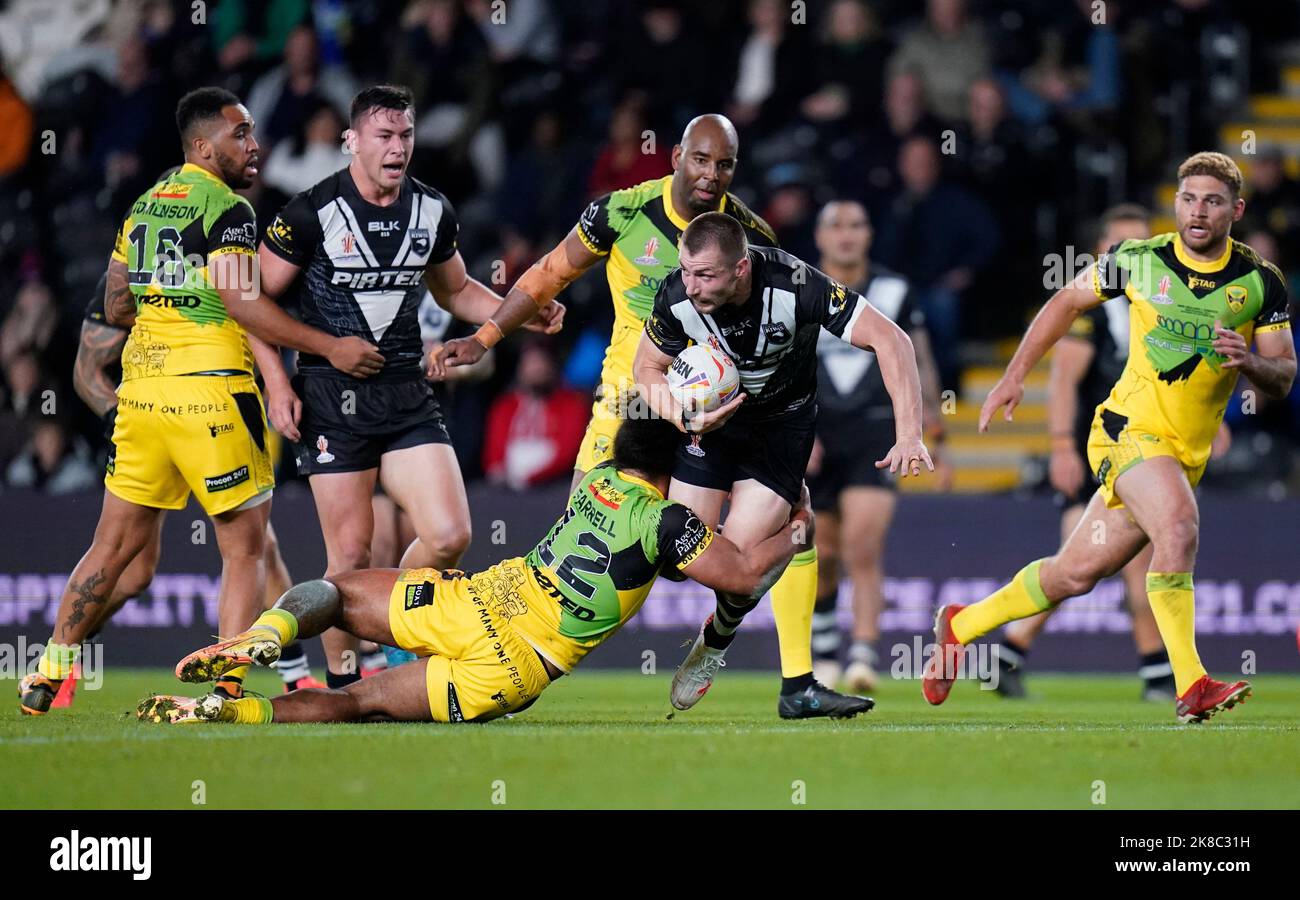 New Zealand's Kieran Foran is tackled by Jamaica's Joel Farrell during ...
