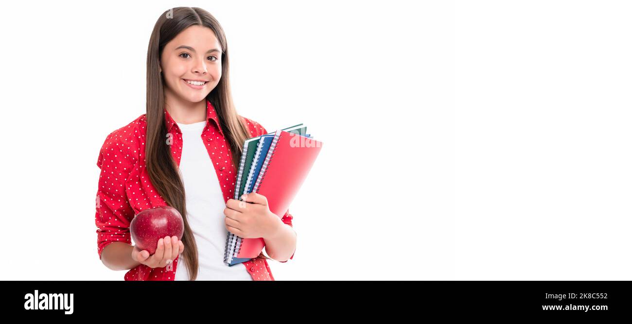 smiling teen girl with notebook. back to school. child with apple ready ...