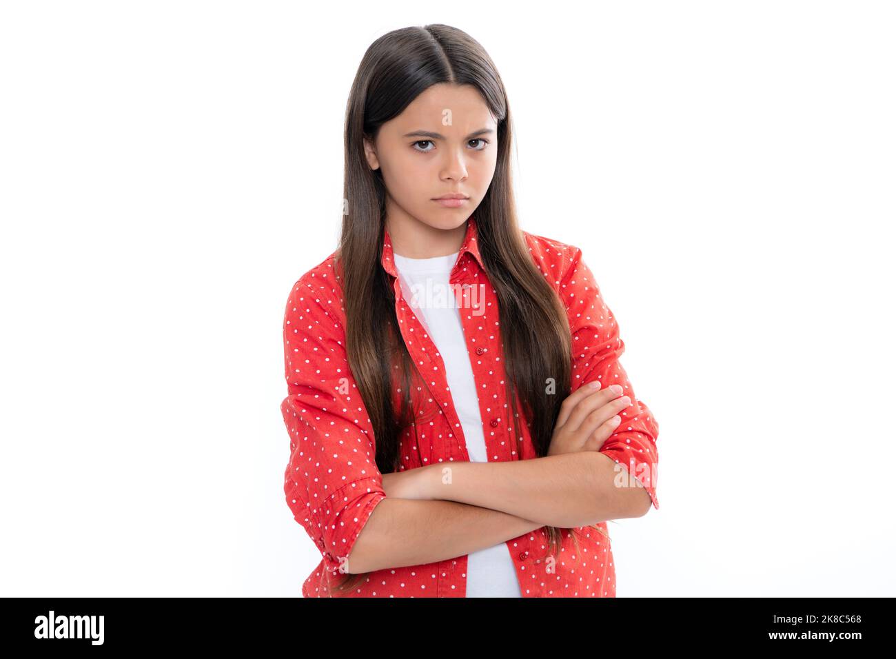 Angry teenager girl, upset and unhappy negative emotion. Studio portrait of sadness anger teen ...