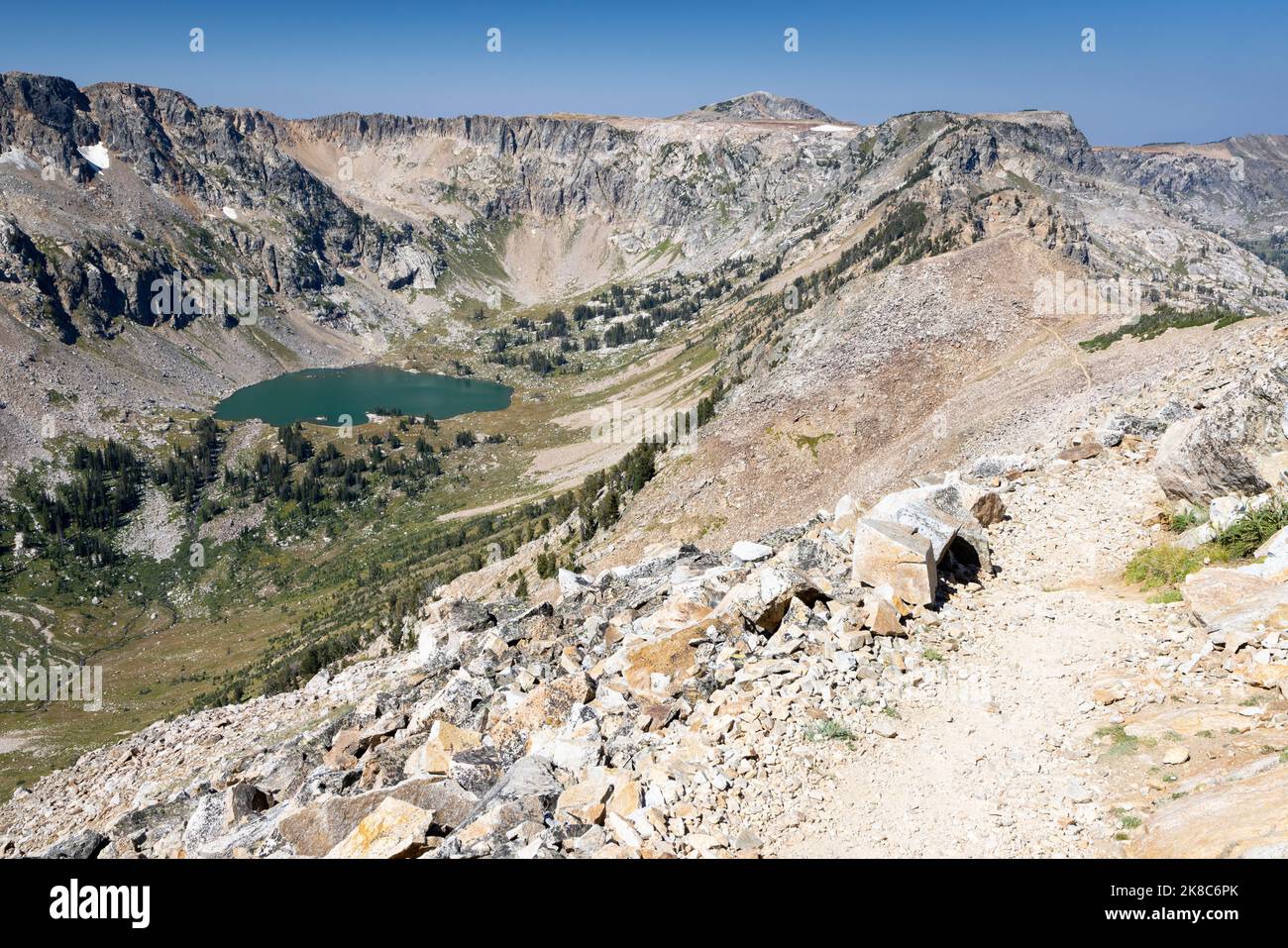 Lake Solitude lying below the Lake Solitude Trail as it descends from ...