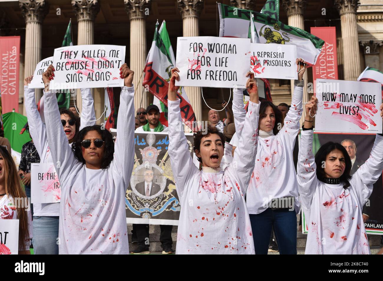 London, England, UK. 22nd Oct, 2022. Protesters hold placards at the ...