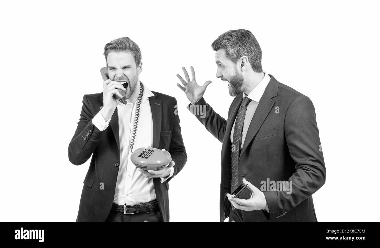 Man with smartphone look at angry businessman shouting in telephone ...