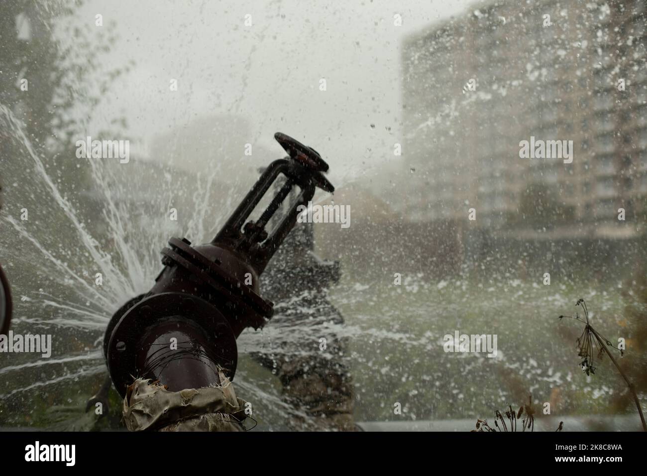 Pipeline accident. Water pours from well. Torn valve. Emergency Stock ...