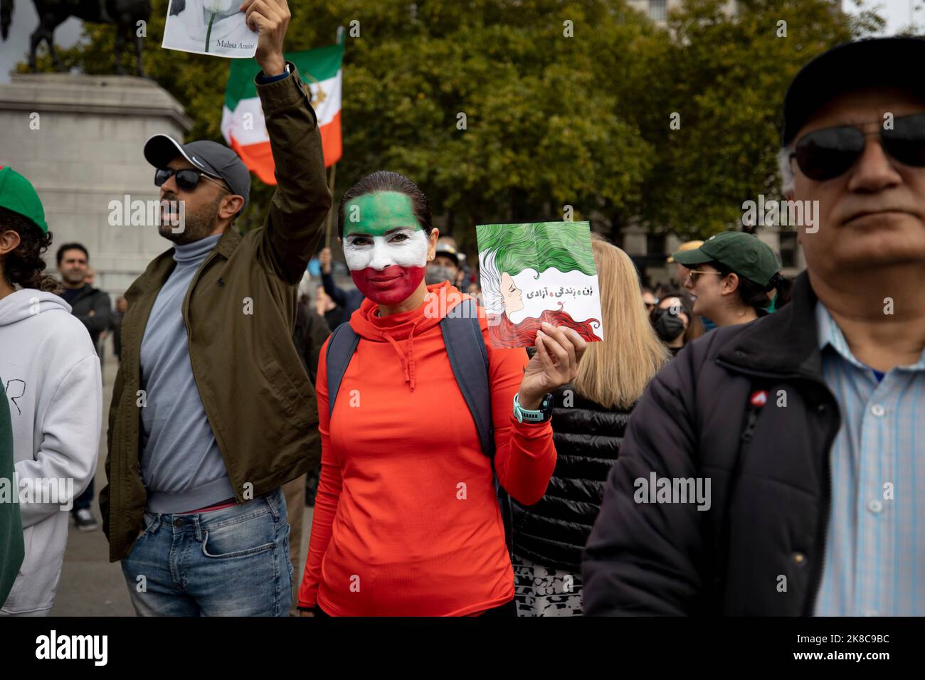 London, UK. 22nd Oct, 2022. A Iranian woman with Iranian face paint ...