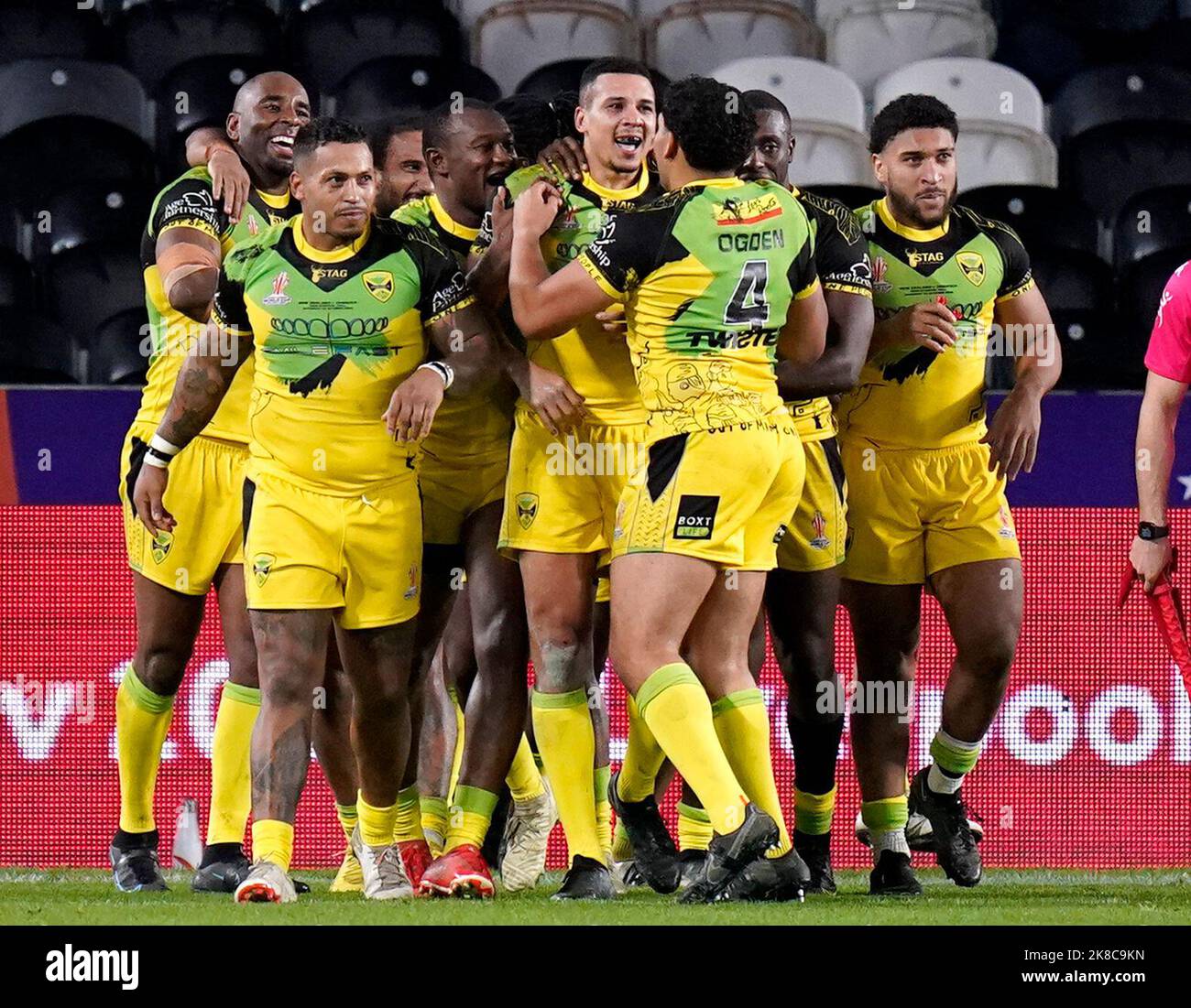 Jamaica's Ben Jones-Bishop (centre) celebrates with team-mates after ...