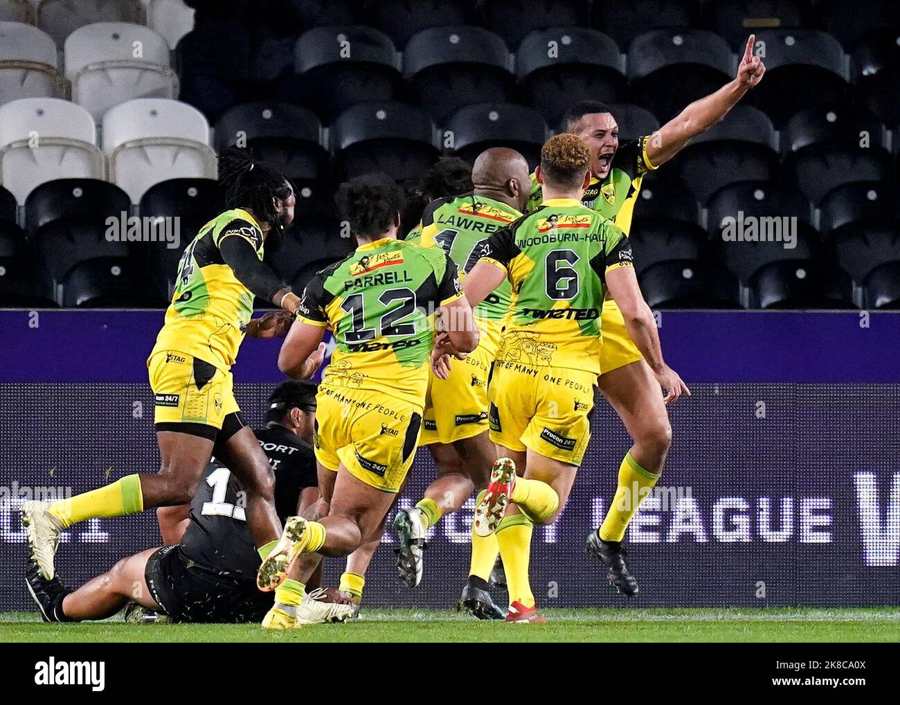 Jamaica's Ben Jones-Bishop (right) celebrates with team-mates after ...