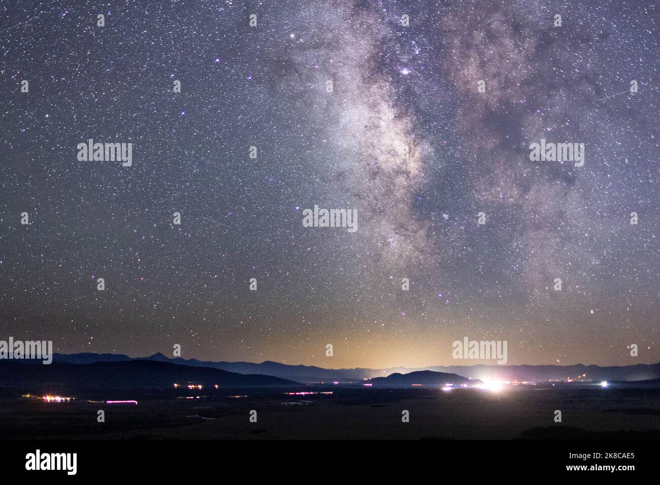 The Milky Way Galaxy rising above light pollution emanating from ...