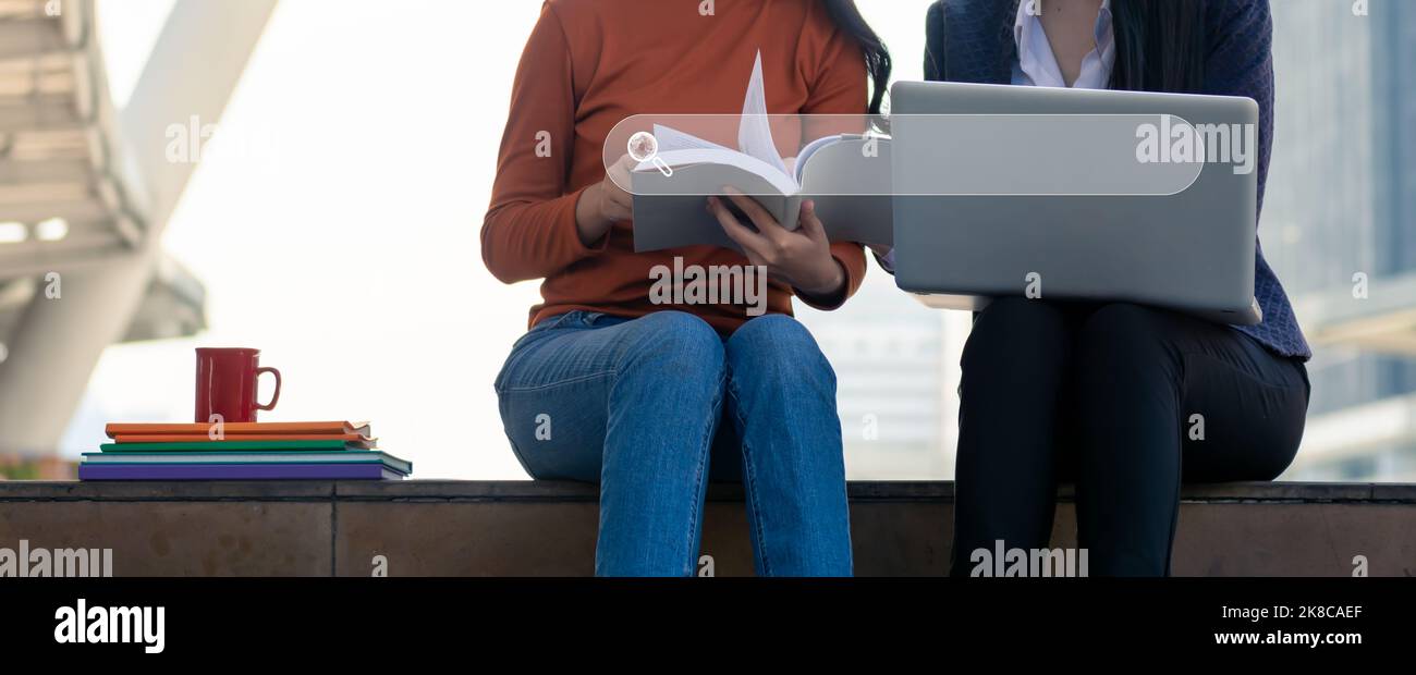 Young woman leaning and using computer searching research information ...