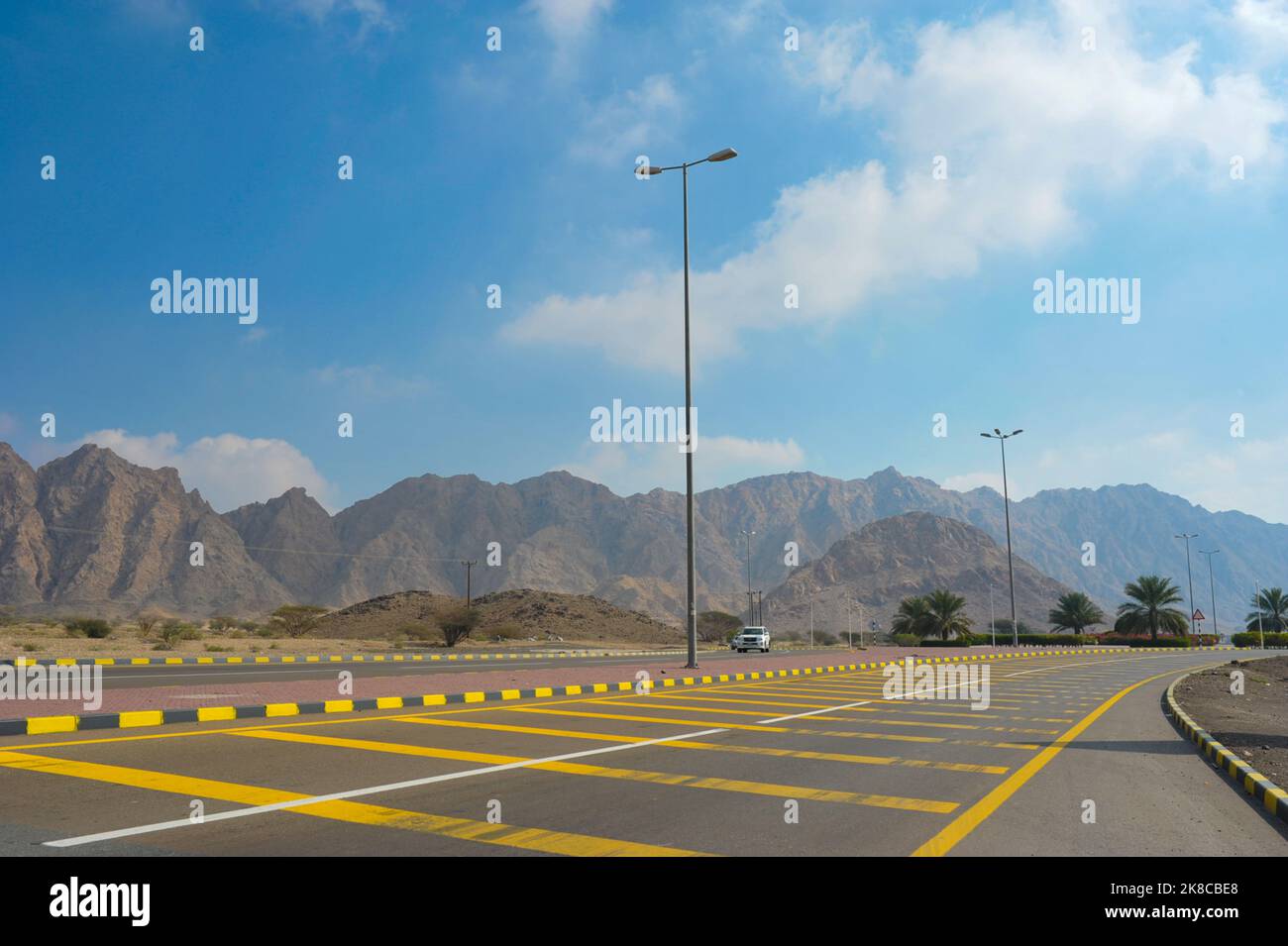 Yellow road markings on a highway in Hatta, an inland exclave of Dubai ...