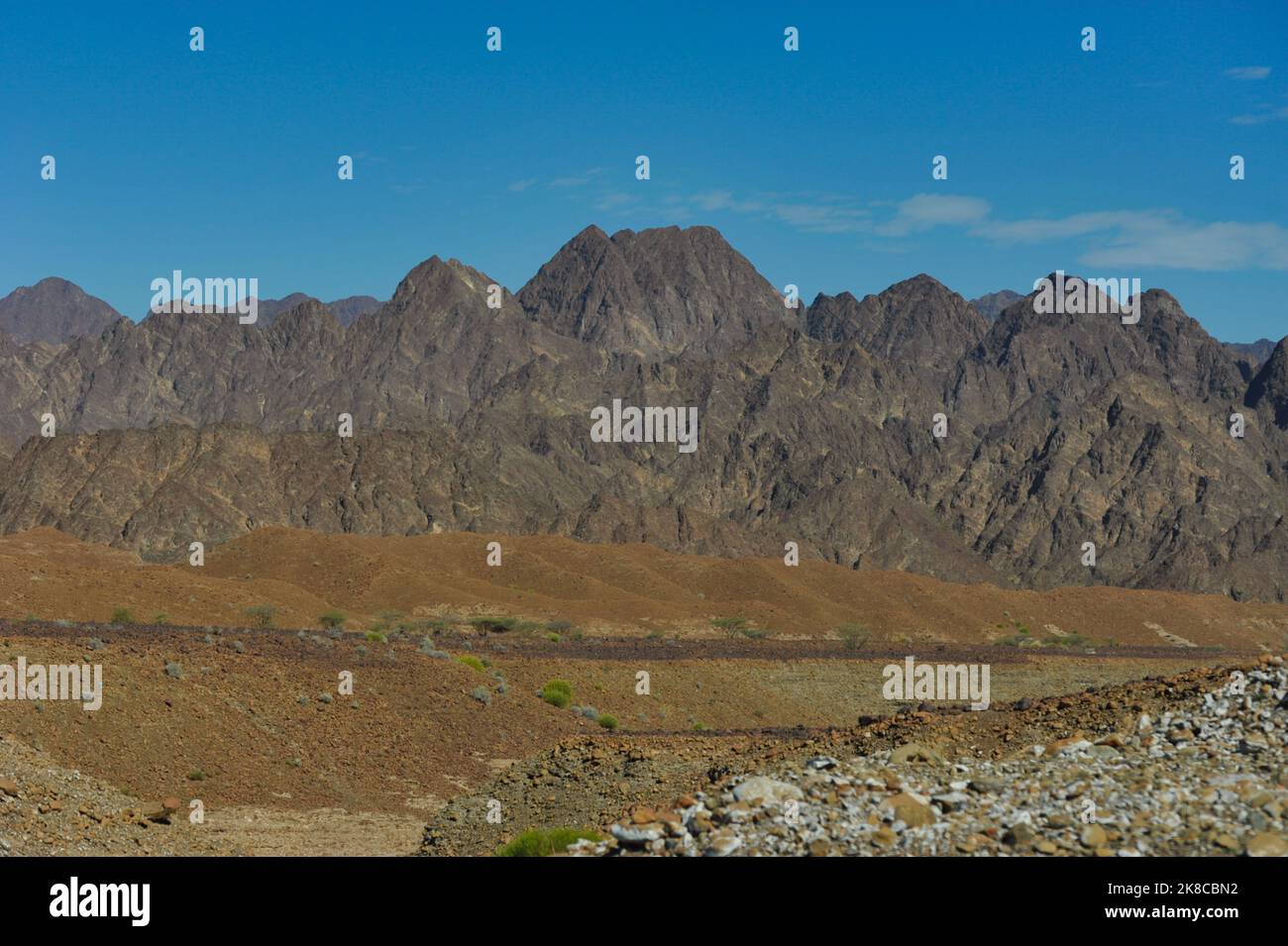 Stunning rugged Hajar Mountains in Hatta. Rocky mountain range on a ...