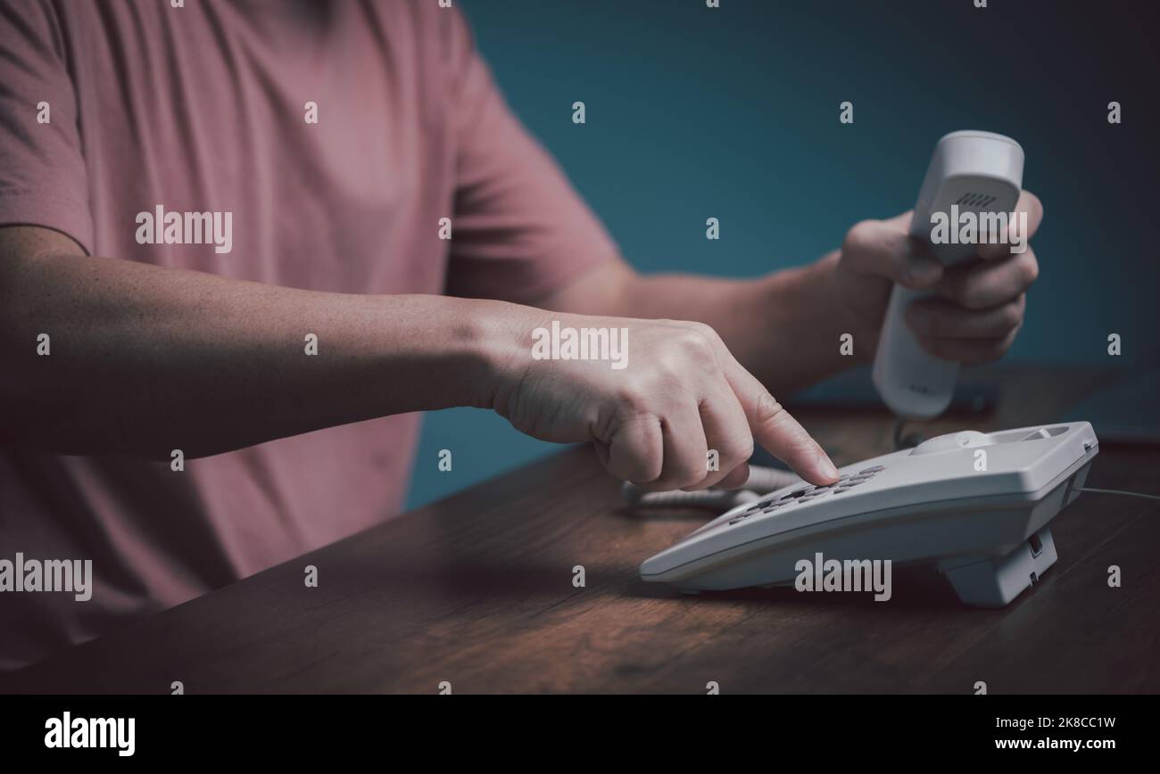 Hand dial a telephone keypad number, communication contact us customer ...