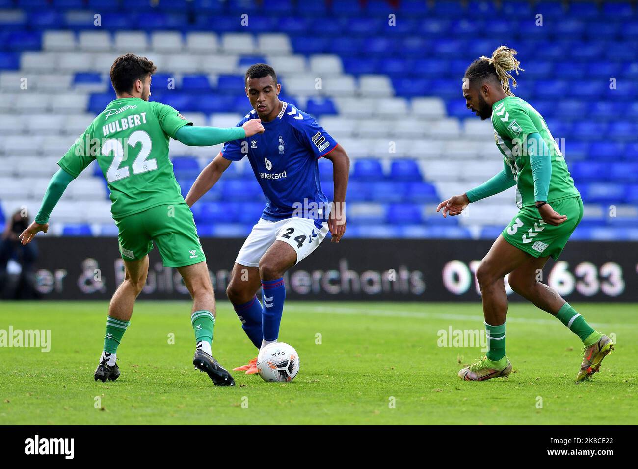 Oldham, UK. 22nd Oct, 2022. David Okagbue of Oldham Athletic tussles ...