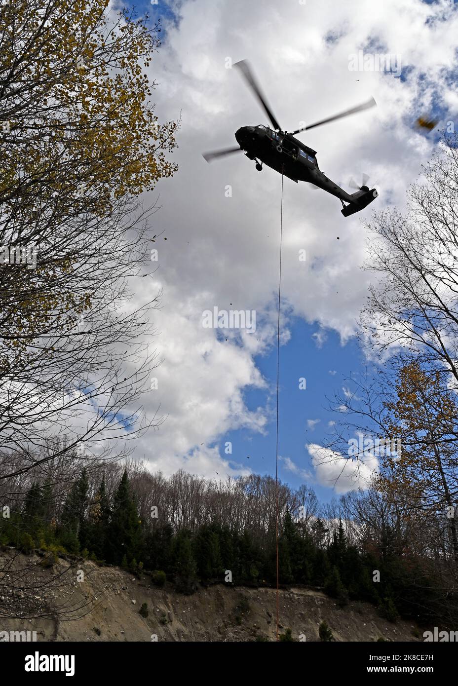 A New Hampshire Army National Guard Black Hawk helicopter with a ...