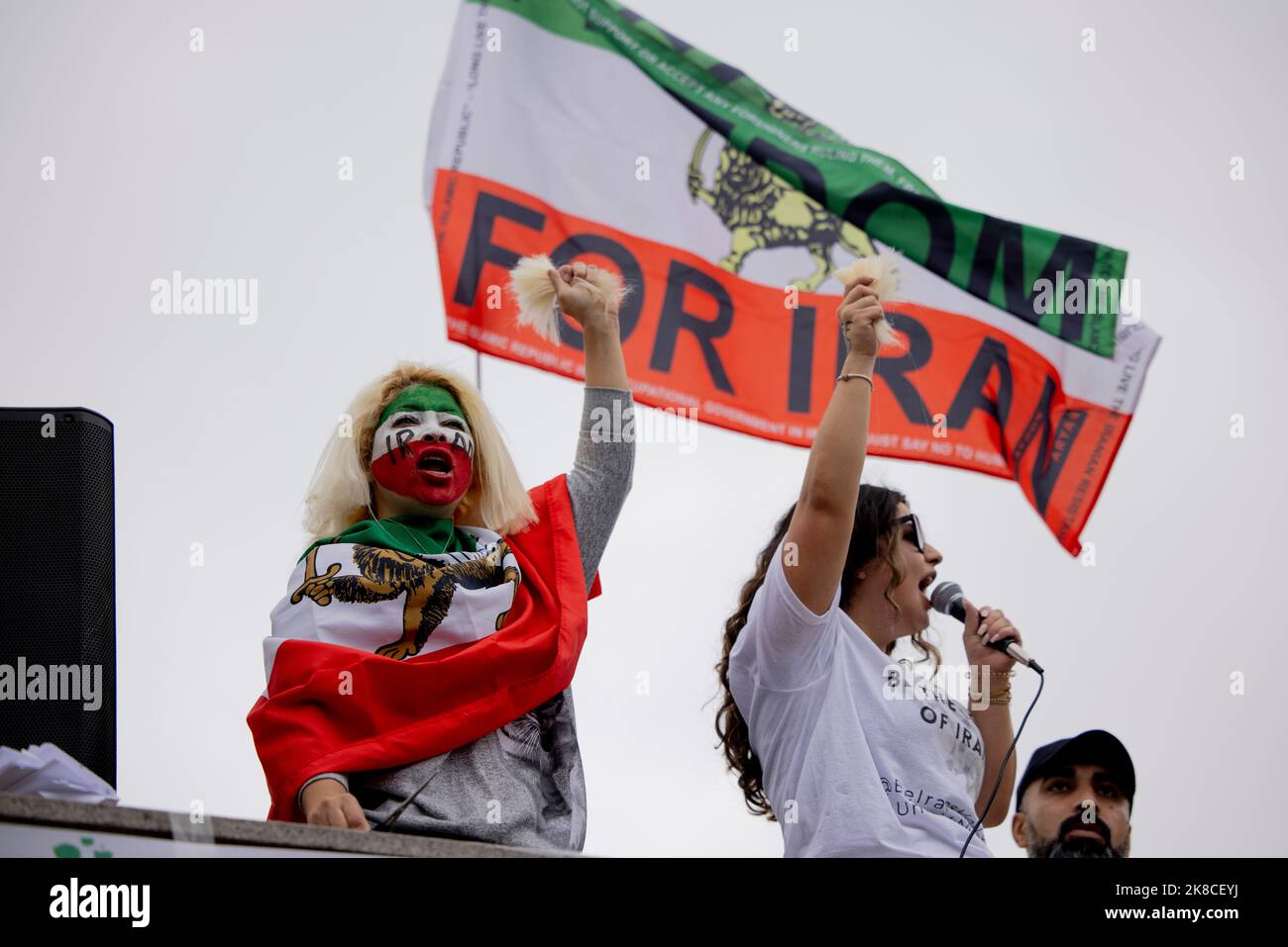 London, UK. 22nd Oct, 2022. An Iranian woman protester seen holding her ...