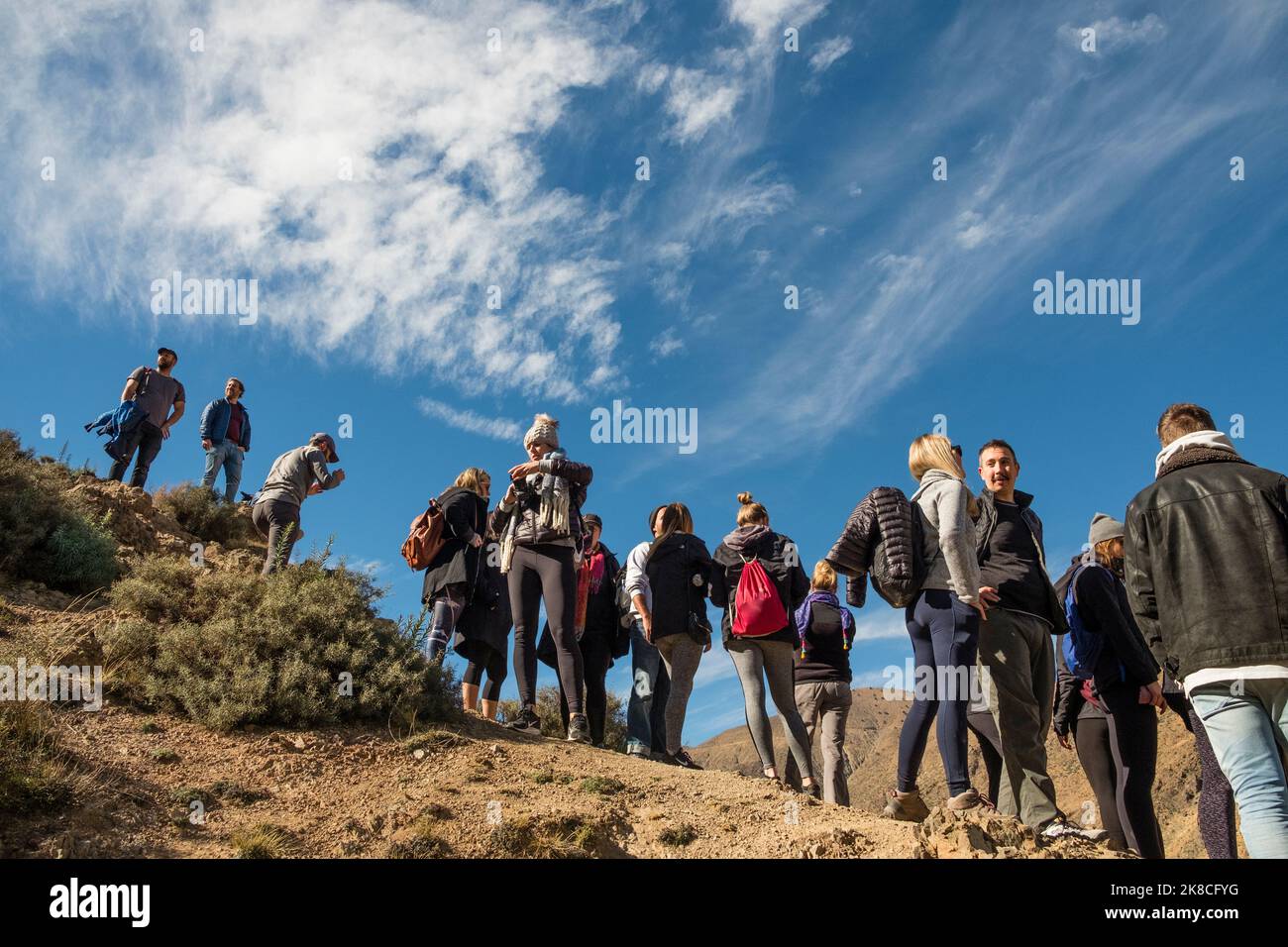 Tourists take a break while hiking in the Atlas Mountains, Ourika ...