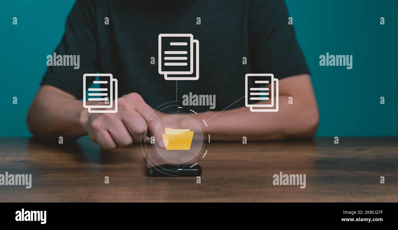 Man using mobile smartphone. Document management system (DMS), online documentation database and ...