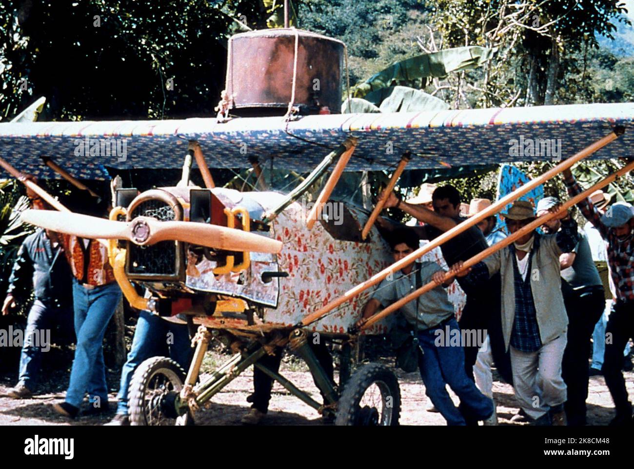 Villagers Push Plane Film: Flight Of Fancy (2000) Director: Noel ...