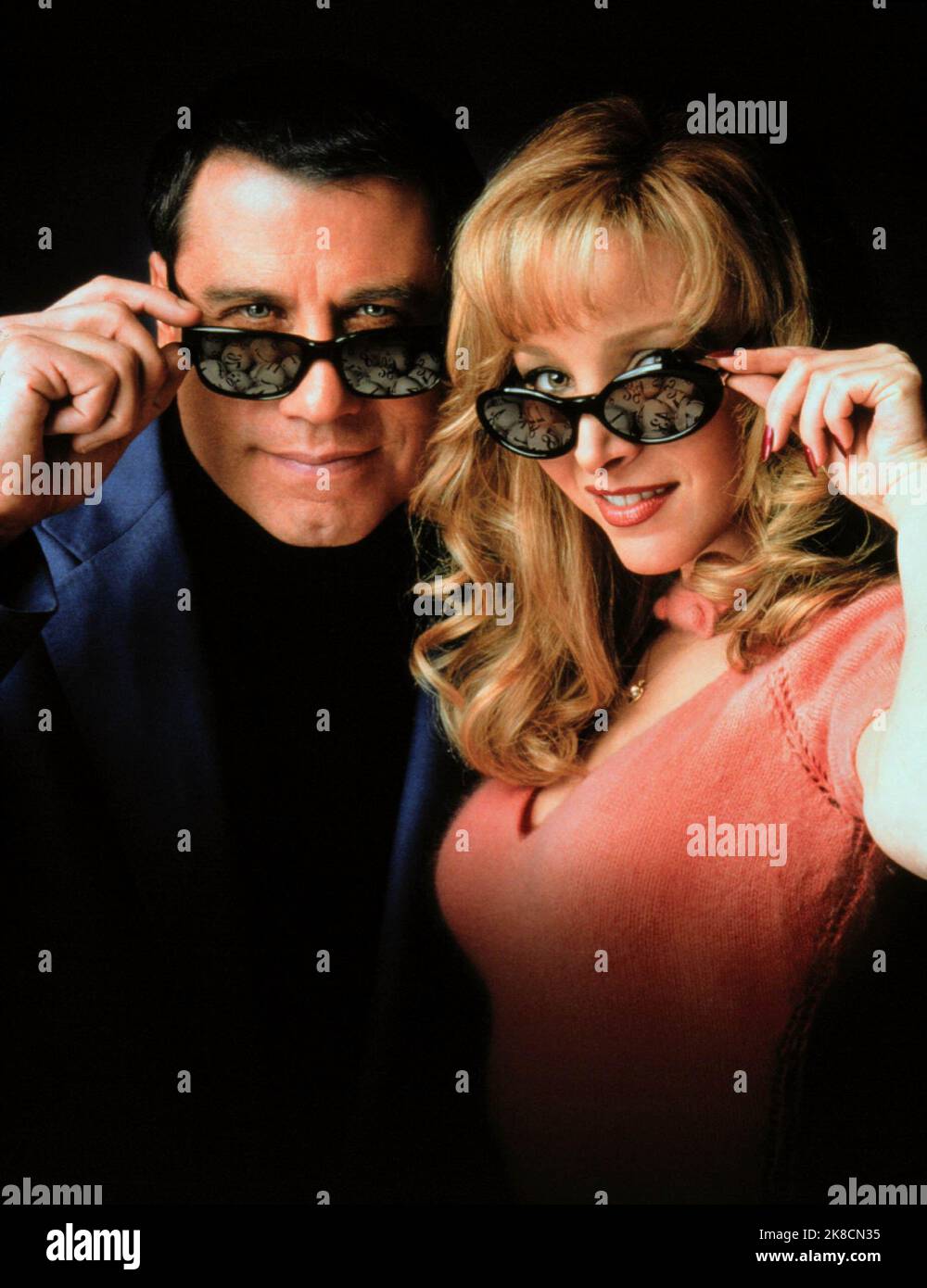 John Travolta & Lisa Kudrow Film: Lucky Numbers (2000) Characters: Russ ...